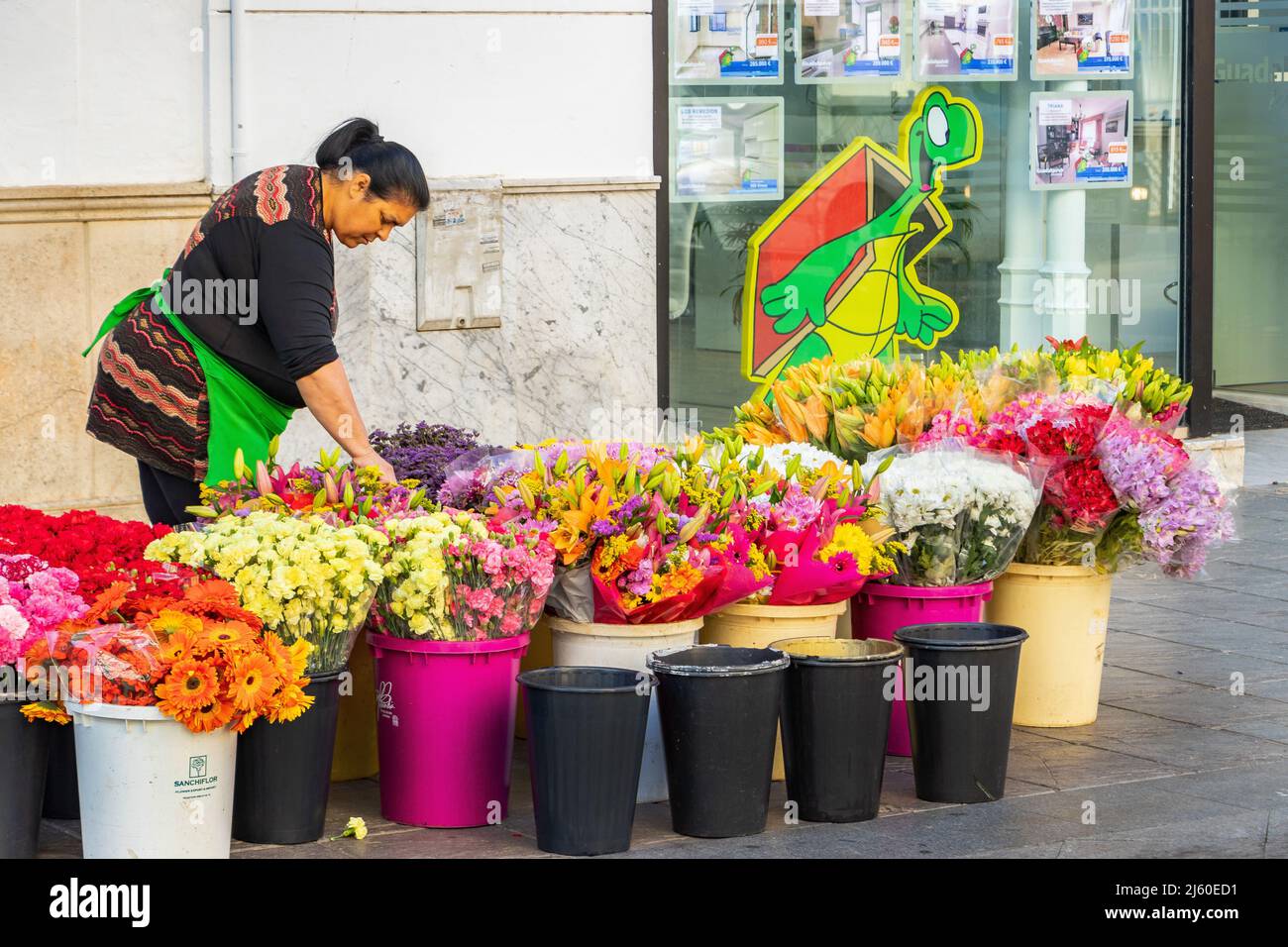 flower seller in street in Seville Sevilla spain Stock Photo - Alamy