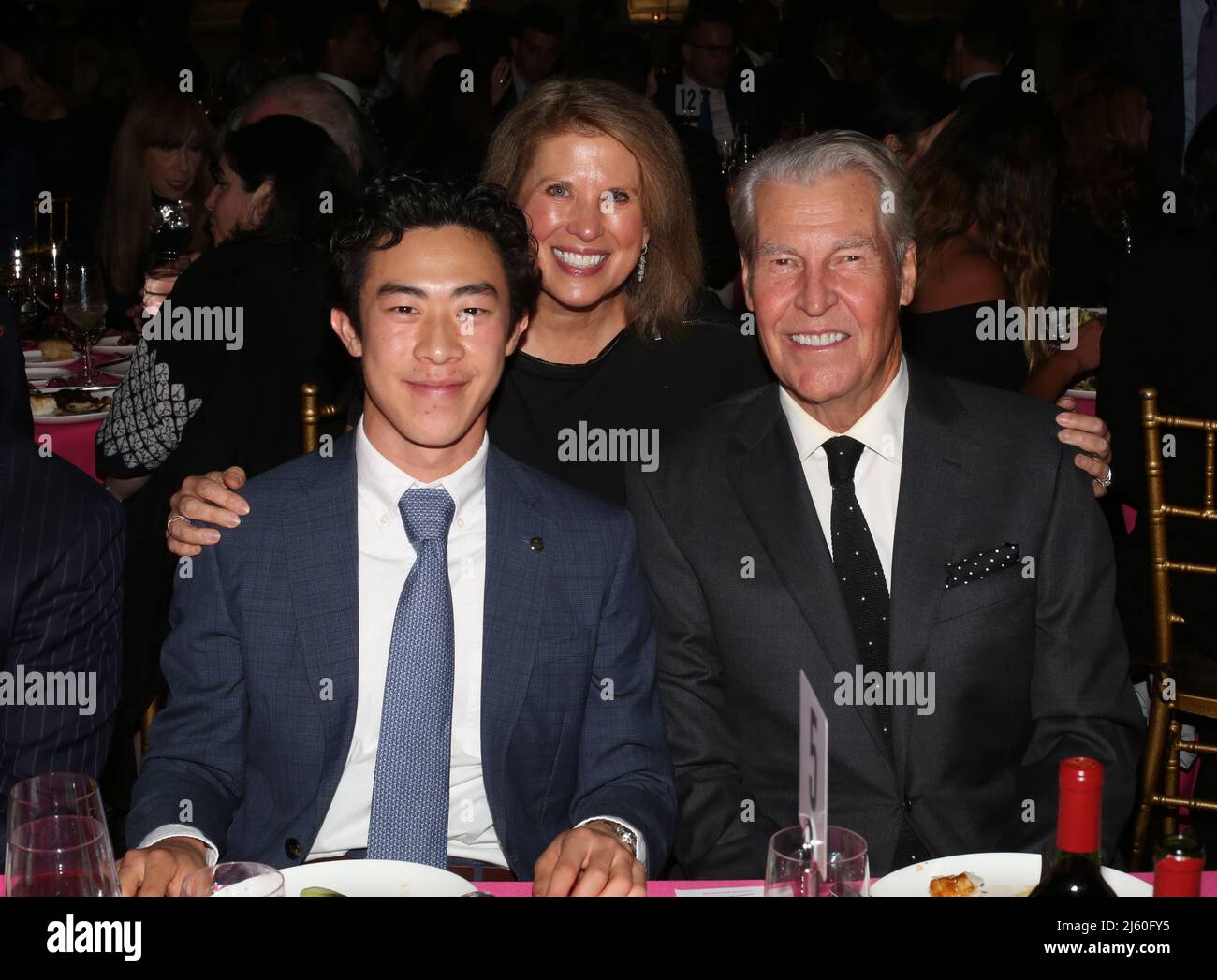 Nathan Chen, Tina Lundgren and Terry Lundgren attend the 2022 Figure ...