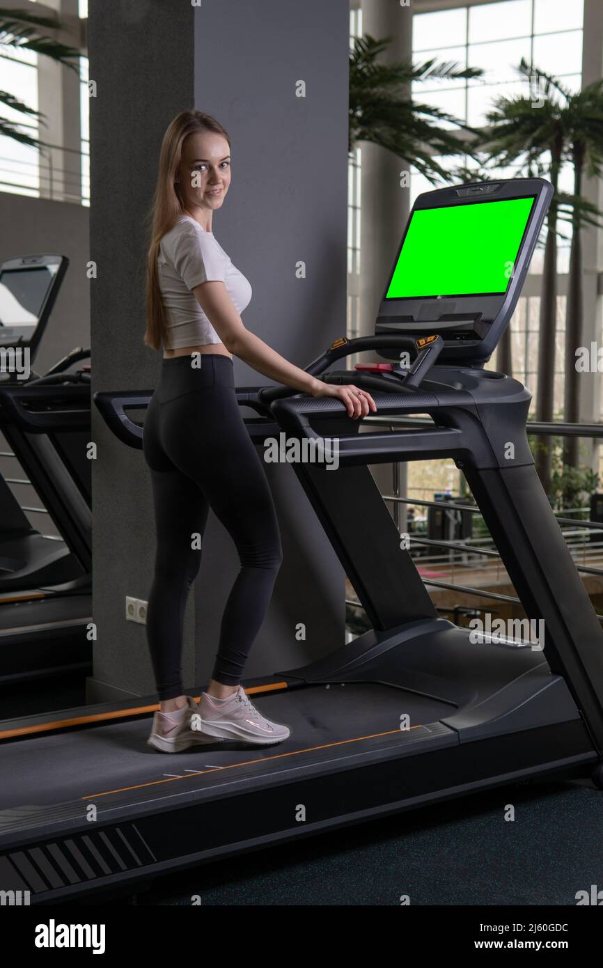 Indoors young treadmill length woman profile full exercise female ...
