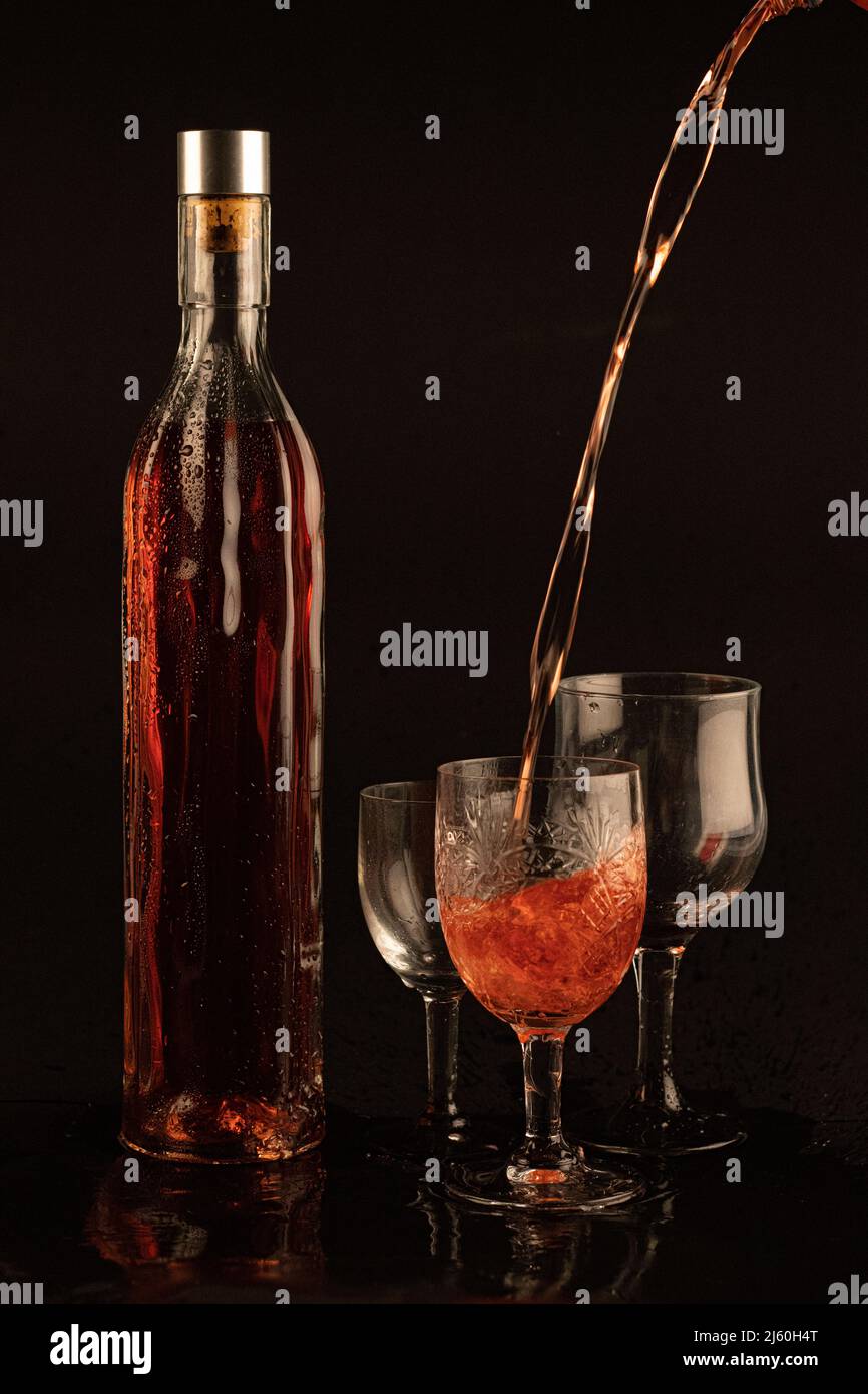 Drink pouring into glass hi-res stock photography and images - Alamy