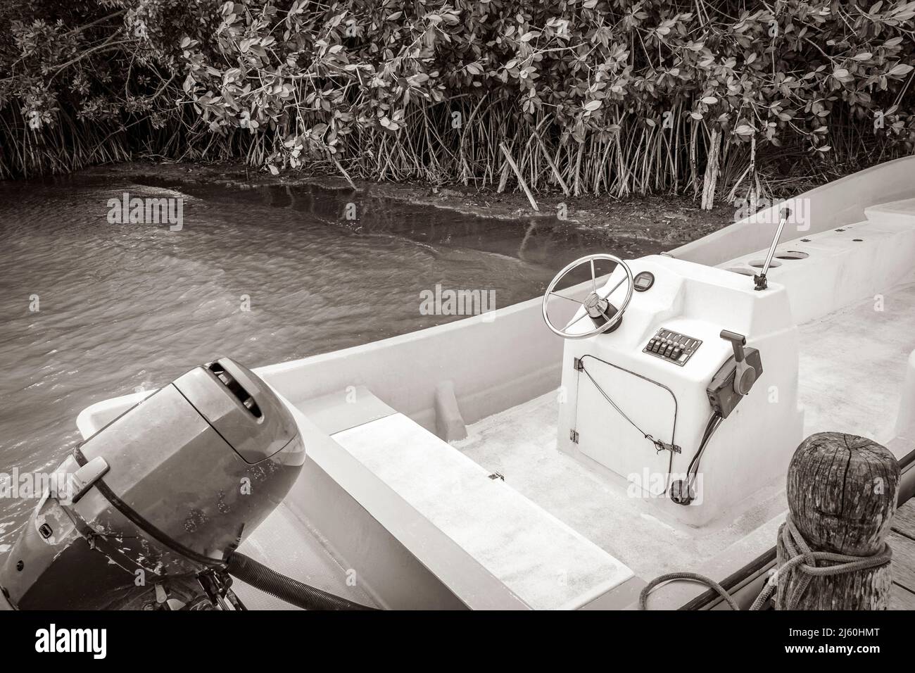 Old black and white picture ofa boat trip at the Muyil Lagoon in the ...
