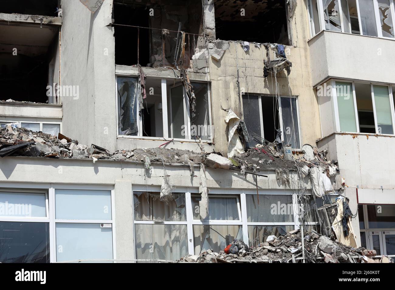 A destroyed residential building after a rocket hit a residential multi ...