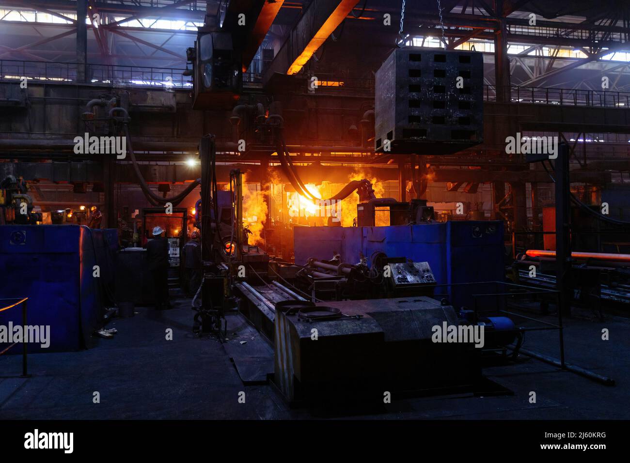 Process of Iron pipe casting at the foundry Stock Photo - Alamy