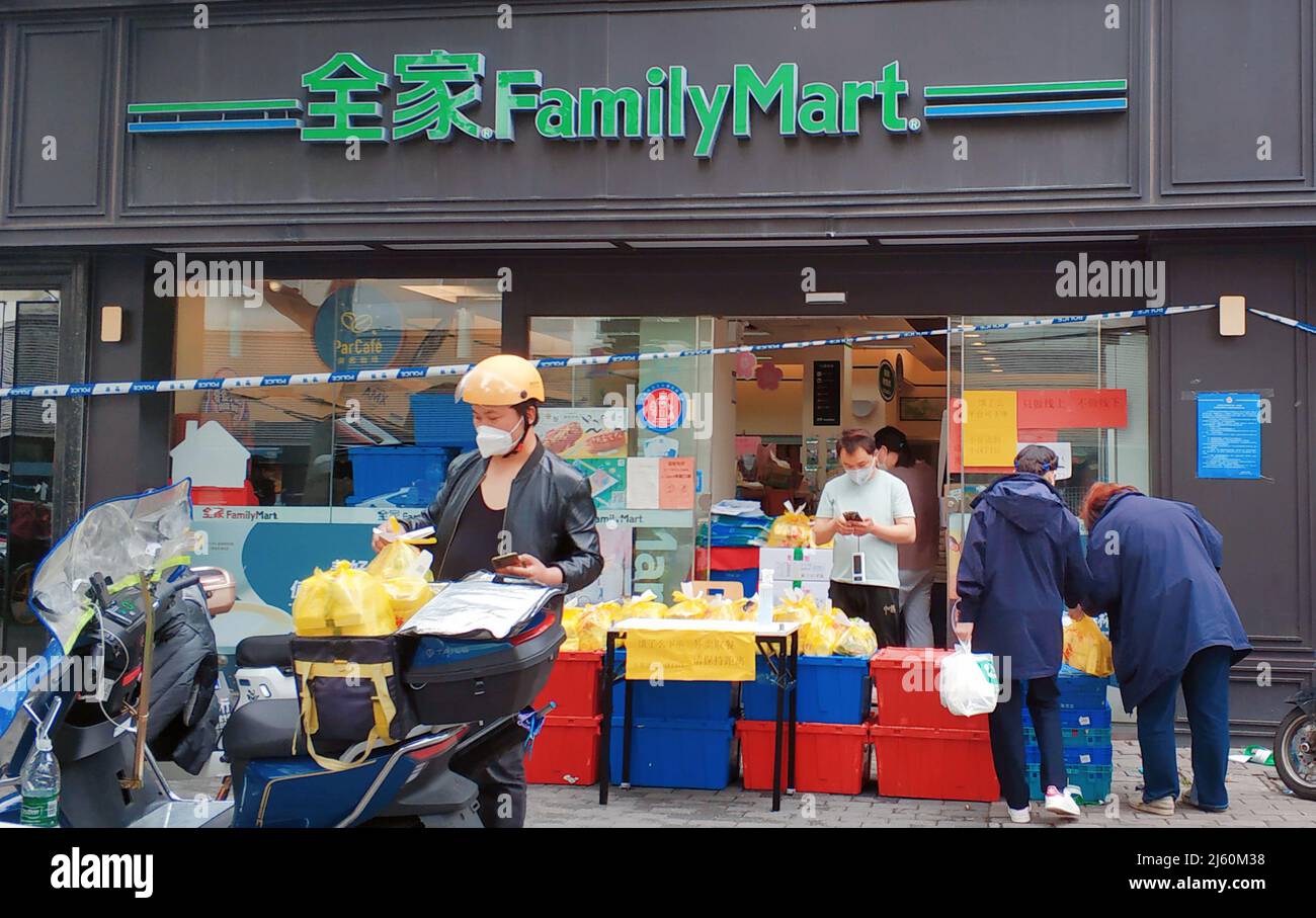SHANGHAI, CHINA - APRIL 26, 2022 - Citizens line up to buy daily ...