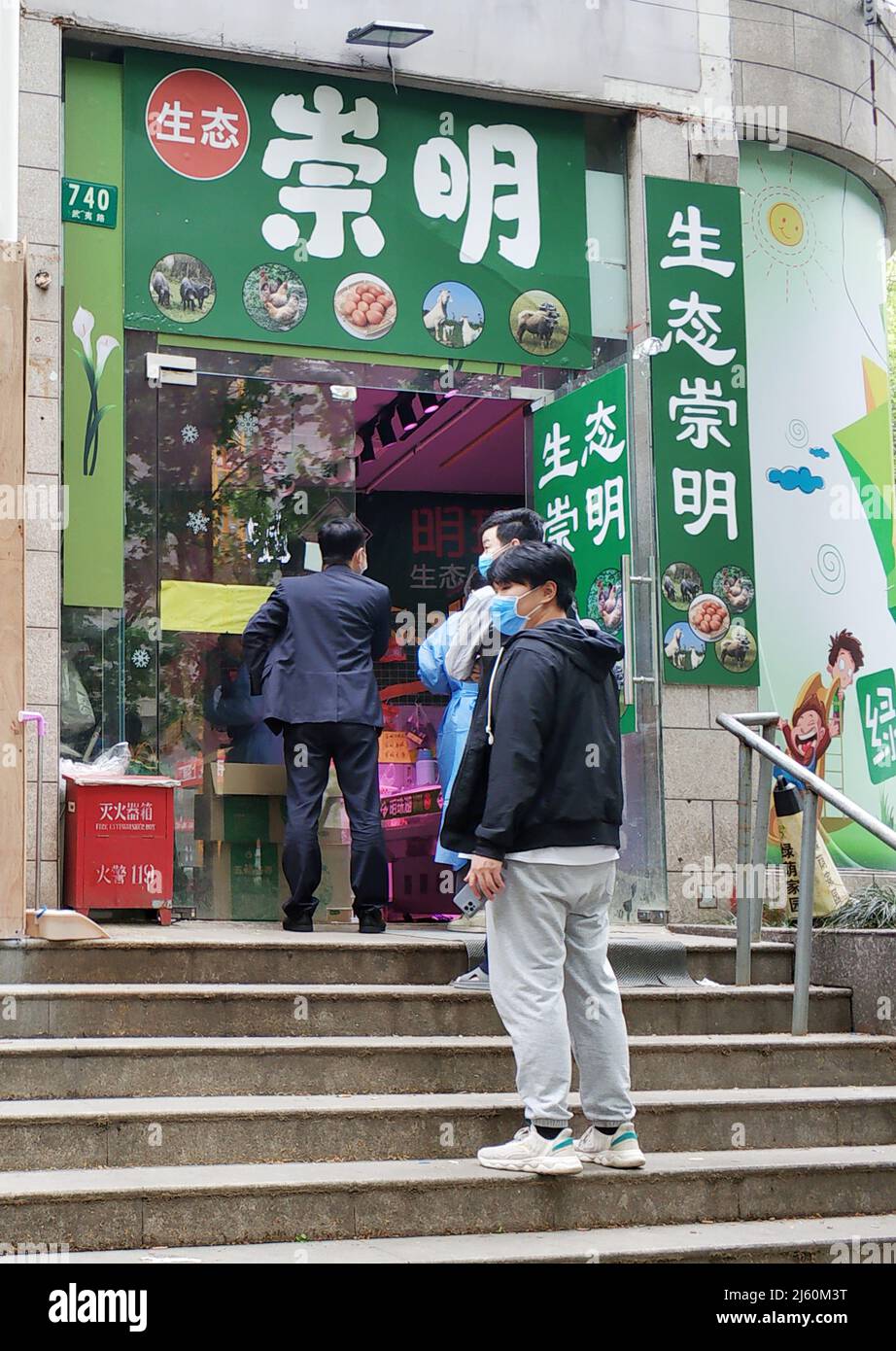 SHANGHAI, CHINA - APRIL 26, 2022 - Citizens line up to buy daily ...