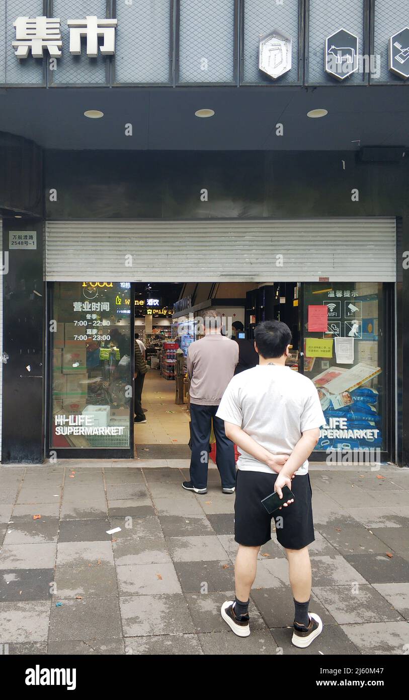 SHANGHAI, CHINA - APRIL 26, 2022 - Citizens line up to buy daily ...