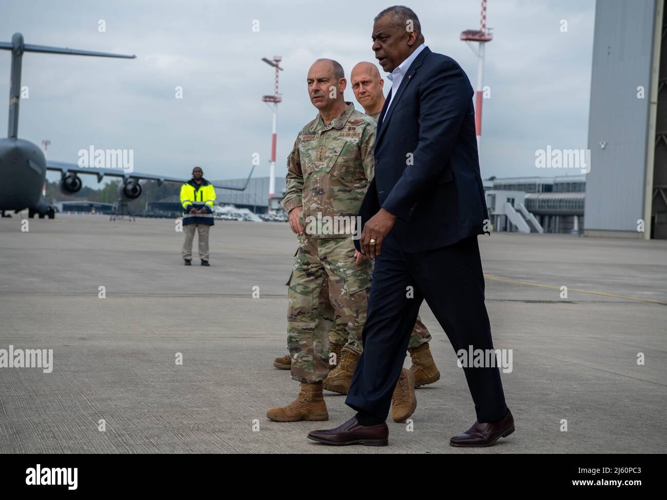 U.S. Secretary of Defense Lloyd Austin III (right) is accompanied by ...