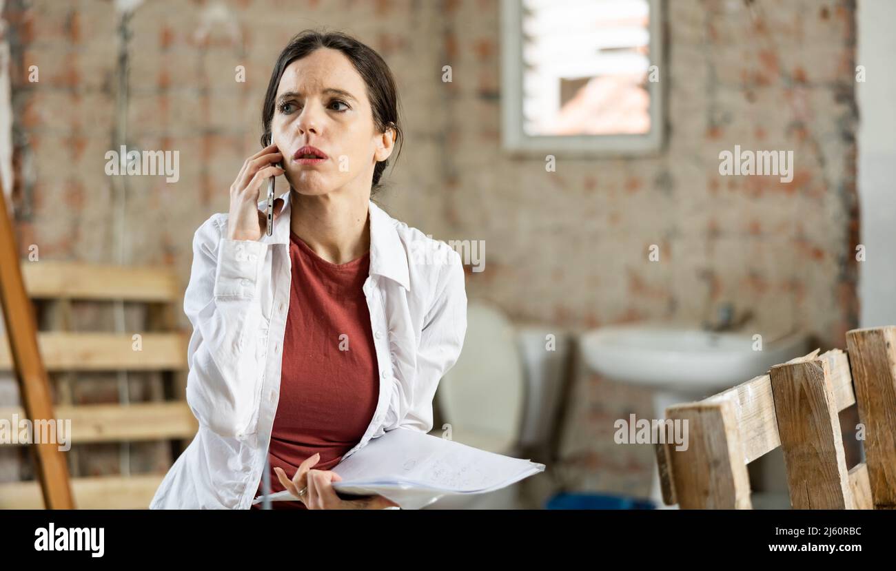 Confused during phone call hi-res stock photography and images - Alamy