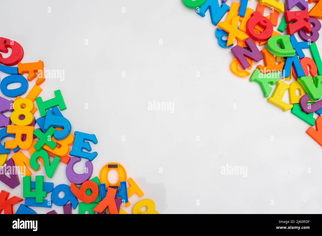 Colorful plastic alphabet letters with copy space Stock Photo - Alamy