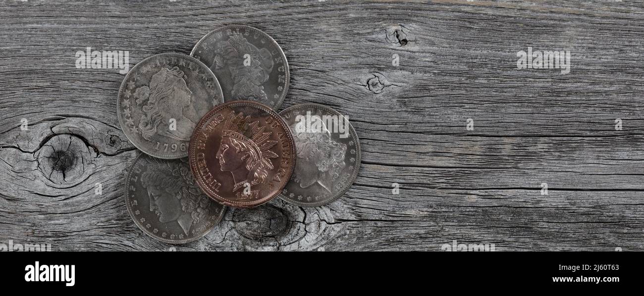 US American vintage coins on rustic wood in close up view Stock Photo ...
