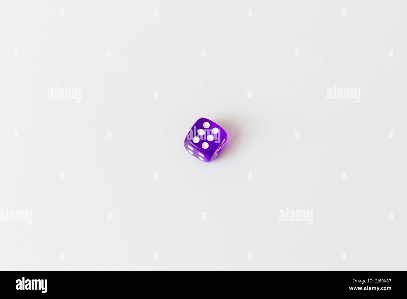 Blue dice with round dots number six on a white isolated background ...