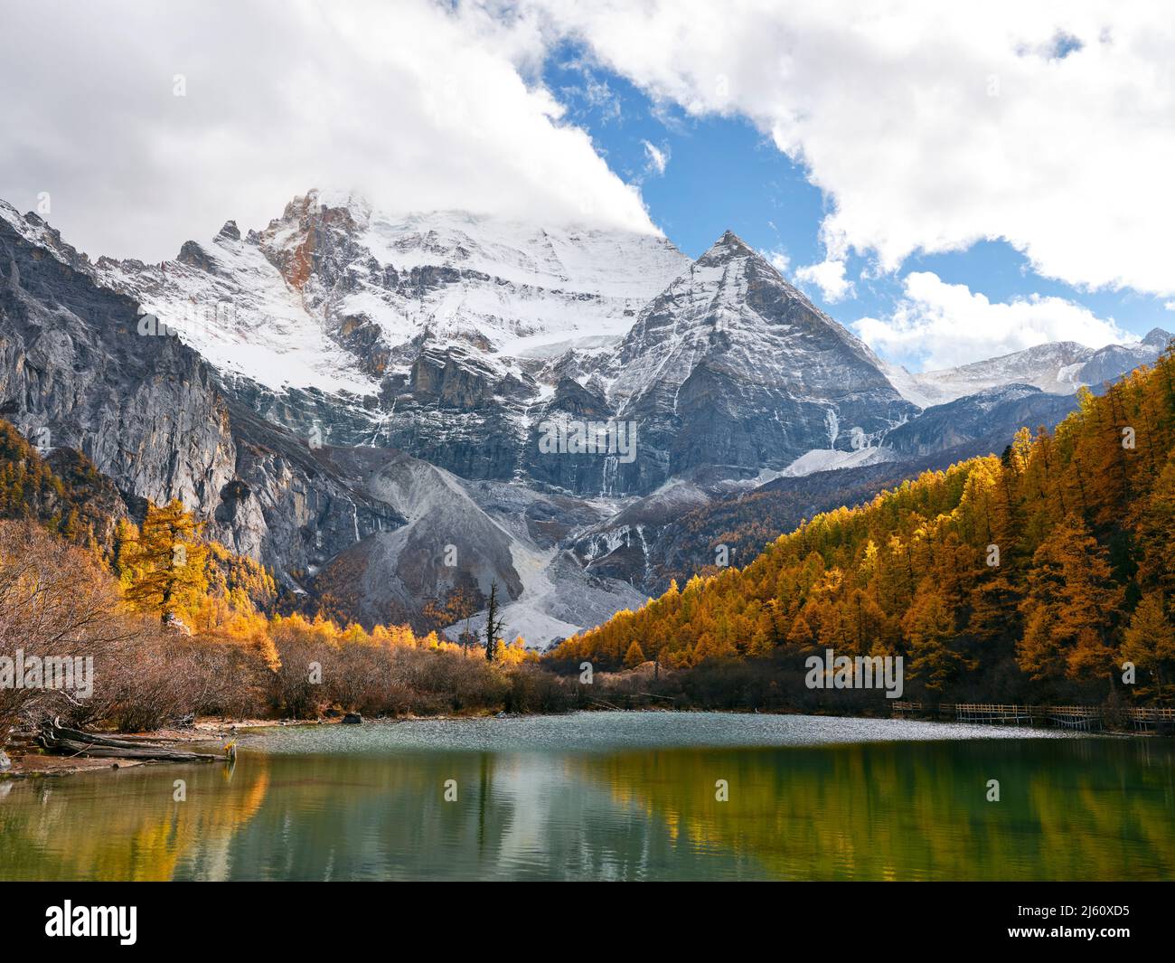 Mount Xiannairi (or Chenrezig in Tibetan) in Yading, Daocheng County ...