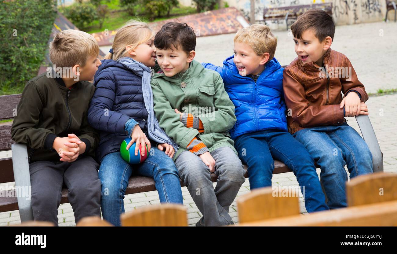 Children throwing ball together hi-res stock photography and images - Alamy