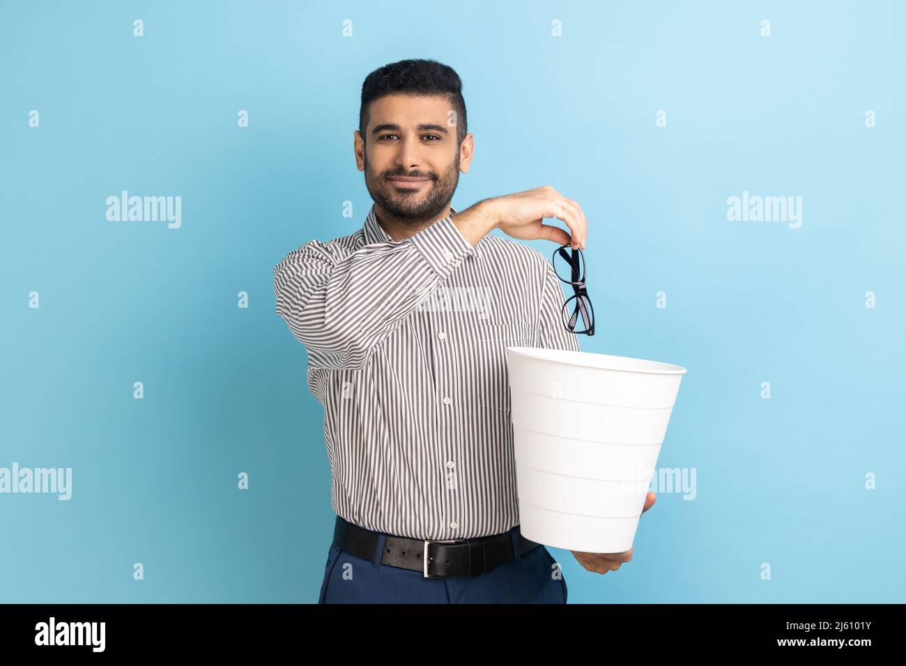 Portrait of smiling happy satisfied businessman throwing out his ...