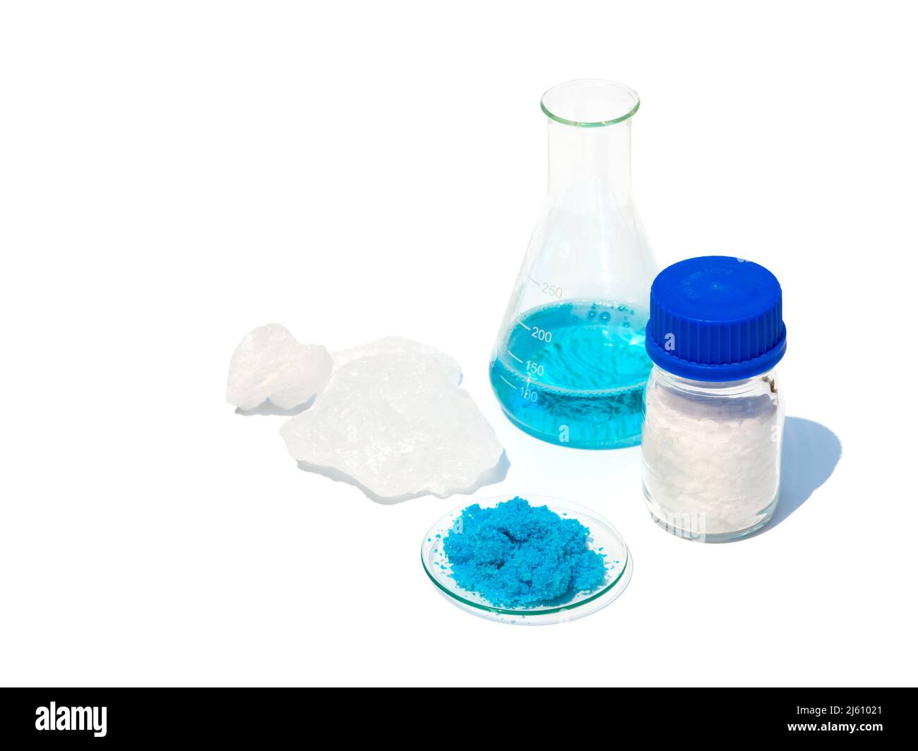 Inorganic chemical on white laboratory table. Copper(II) sulfate ...