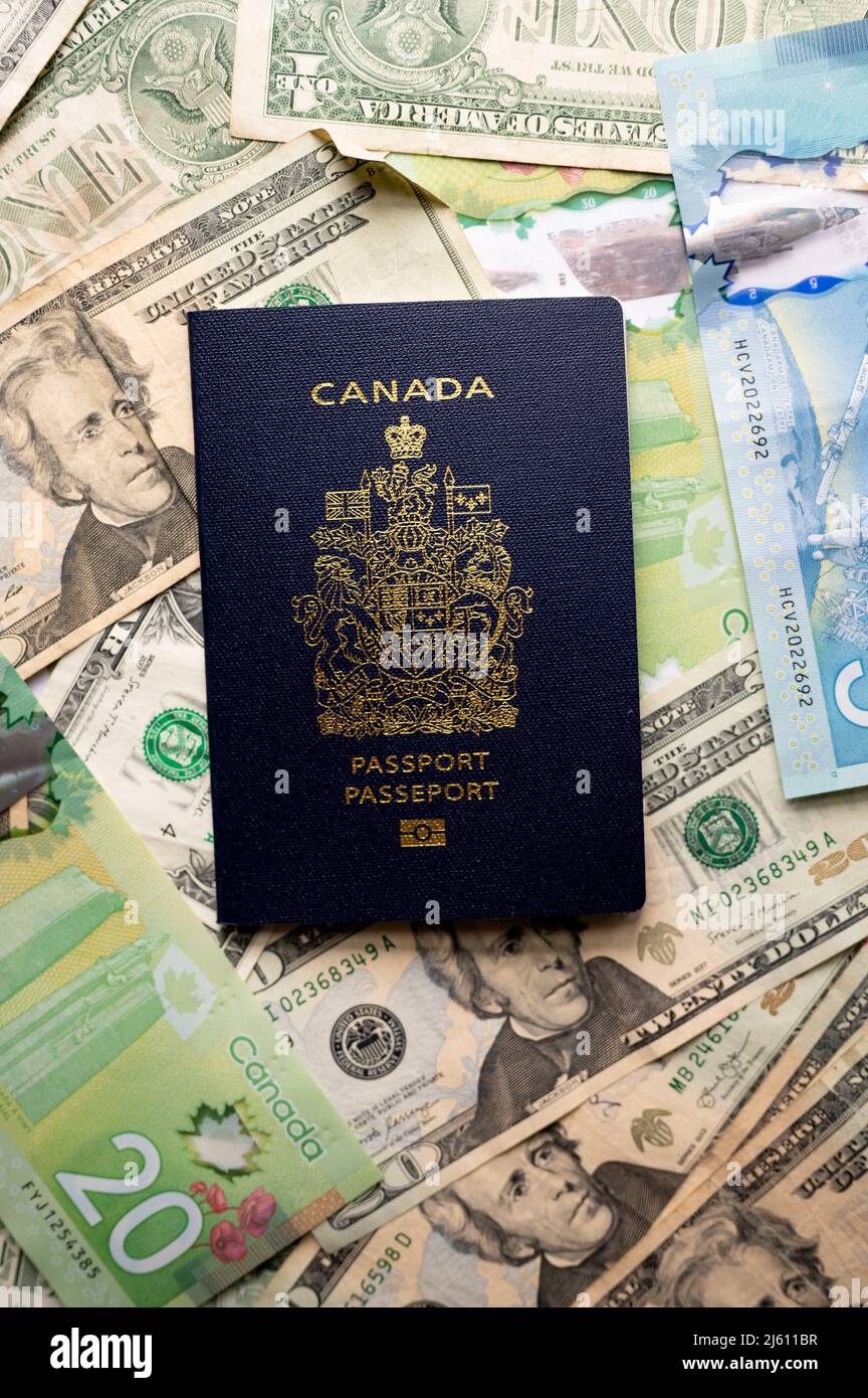 Calgary, Alberta - April 24, 2022: Canadian passport with american and ...