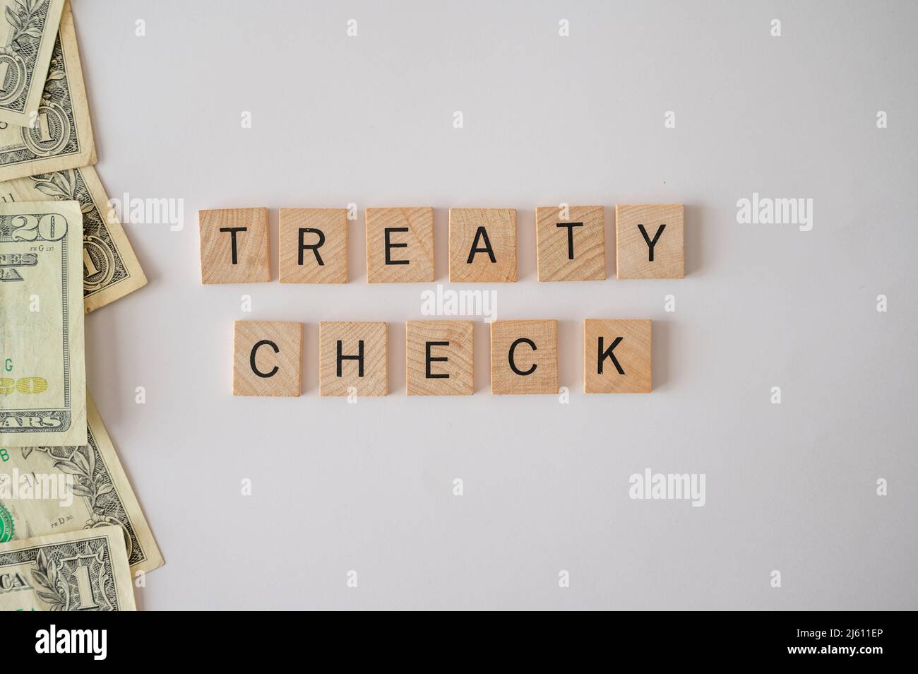 Indigenous finance concept with treaty check in block letters Stock ...