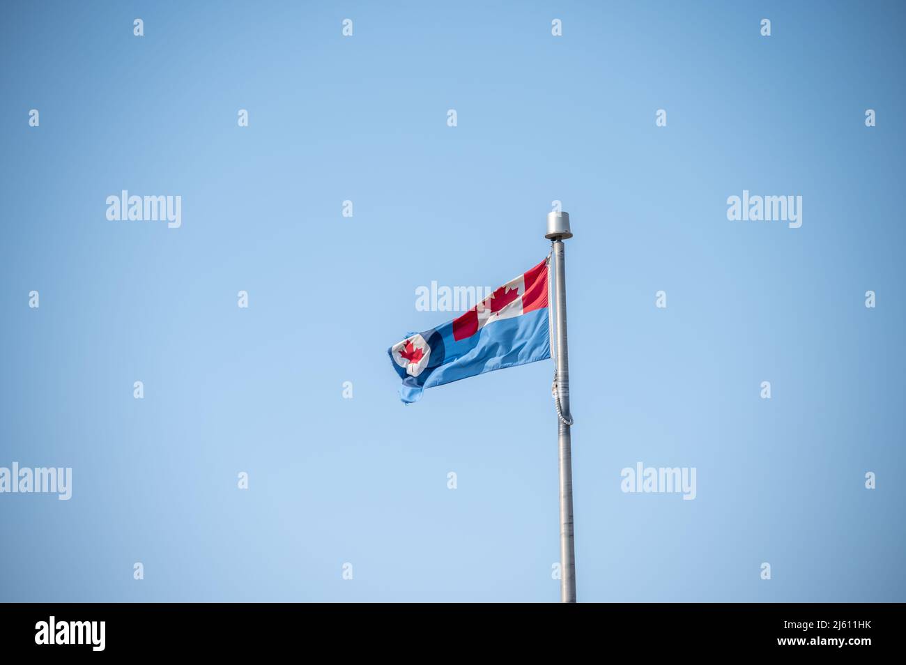 Royal Canadian Air Force (RCAF) flag on blue sky Stock Photo - Alamy
