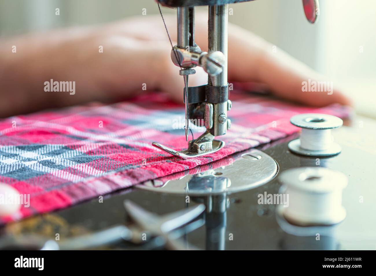 Sewing machine, close-up, object hobby and work. factory production of ...