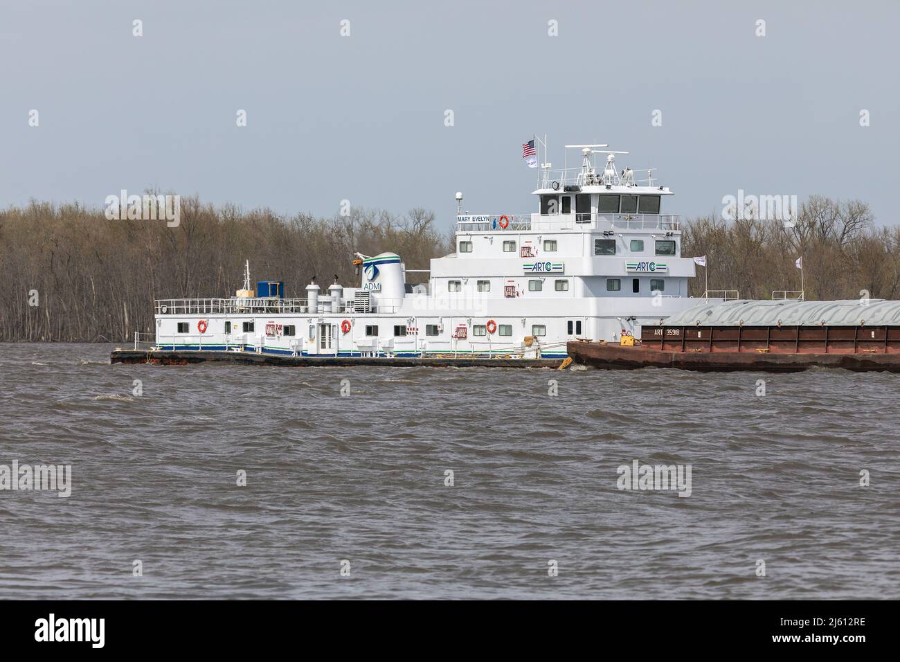 The barge tug Mary Evelyn passing Sullivan Slough in Des Moines County ...