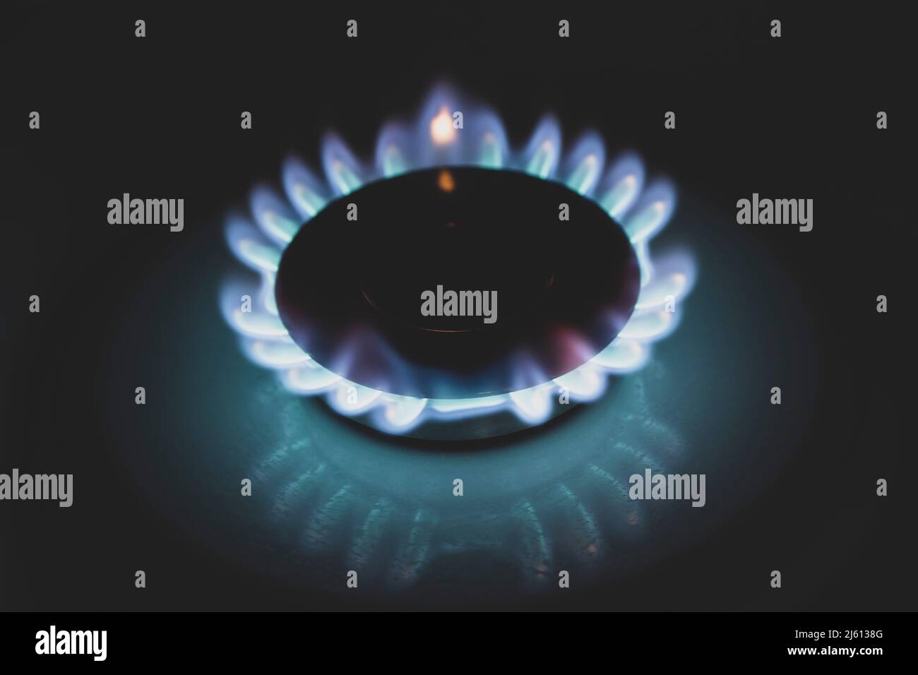 Gas burner on black modern kitchen stove. kitchen gas cooker with ...