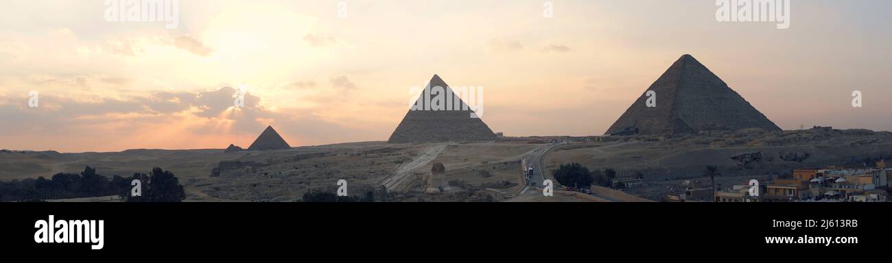 The great sphinx and pyramids under bright sun. panoramic view of the ...