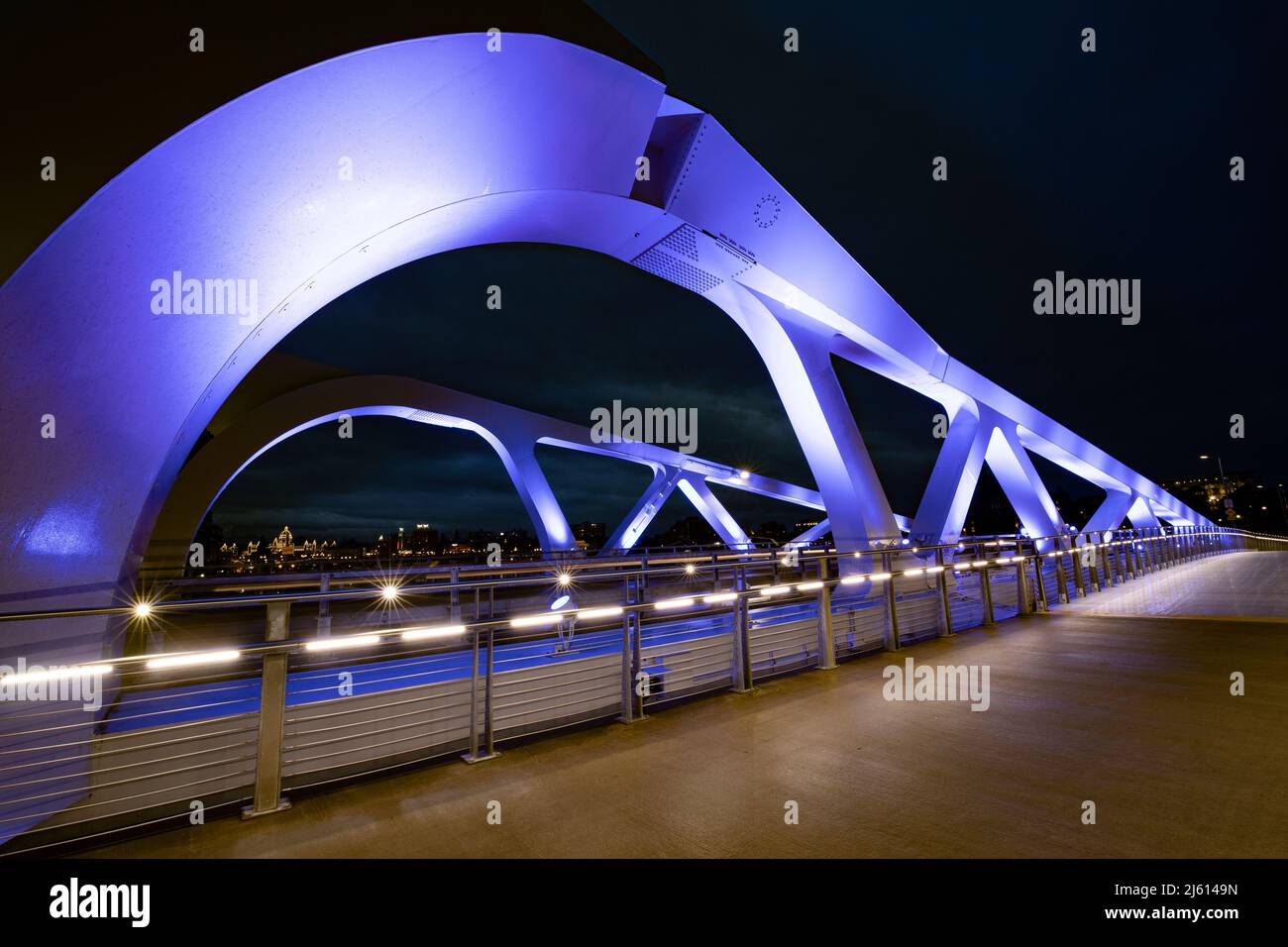 Pedestrian walkway on the Johnson Street Bridge at night - Victoria ...