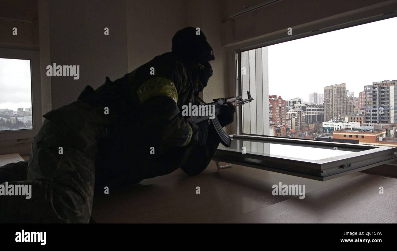 KYIV, UKRAINE 02 March. A member of the Kyiv defense battalion takes ...