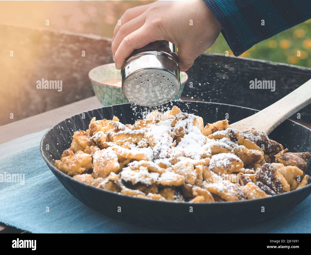Sprinkling powdered sugar in slow hi-res stock photography and images ...