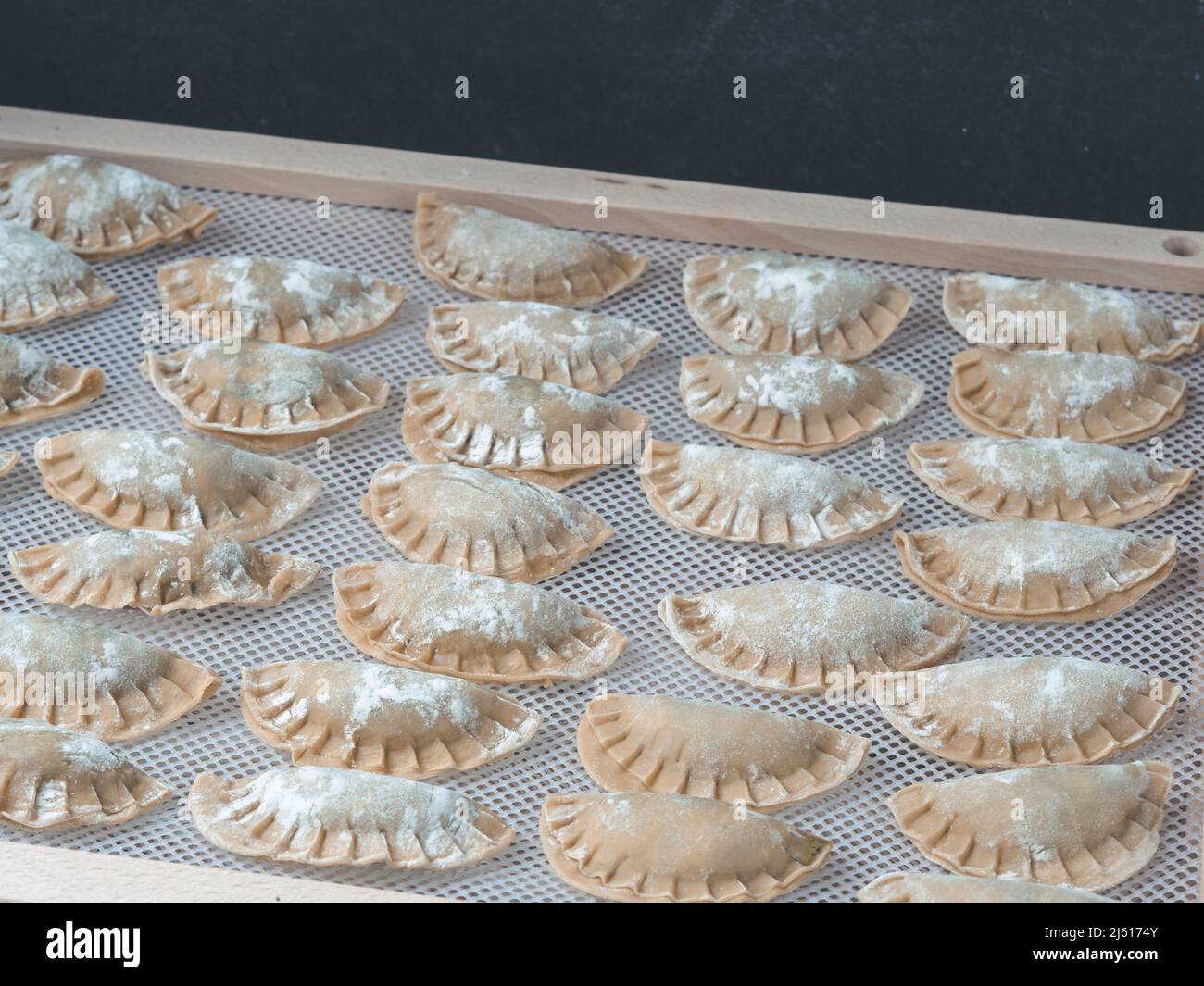 tasty raw ravioli with flour how to make homemade ravioli Stock Photo ...