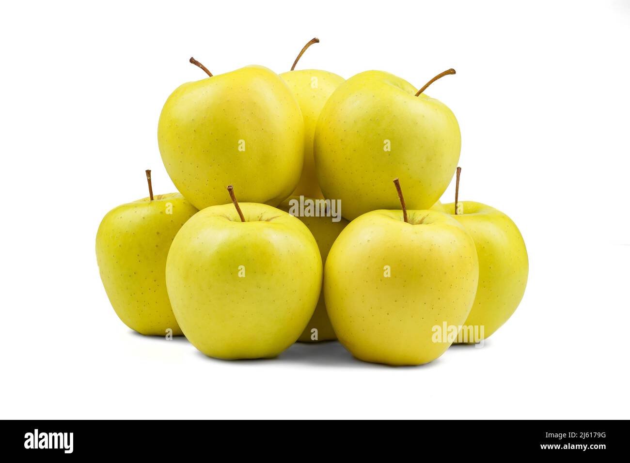 Group of yellow apples isolated on white background forming a huddled ...