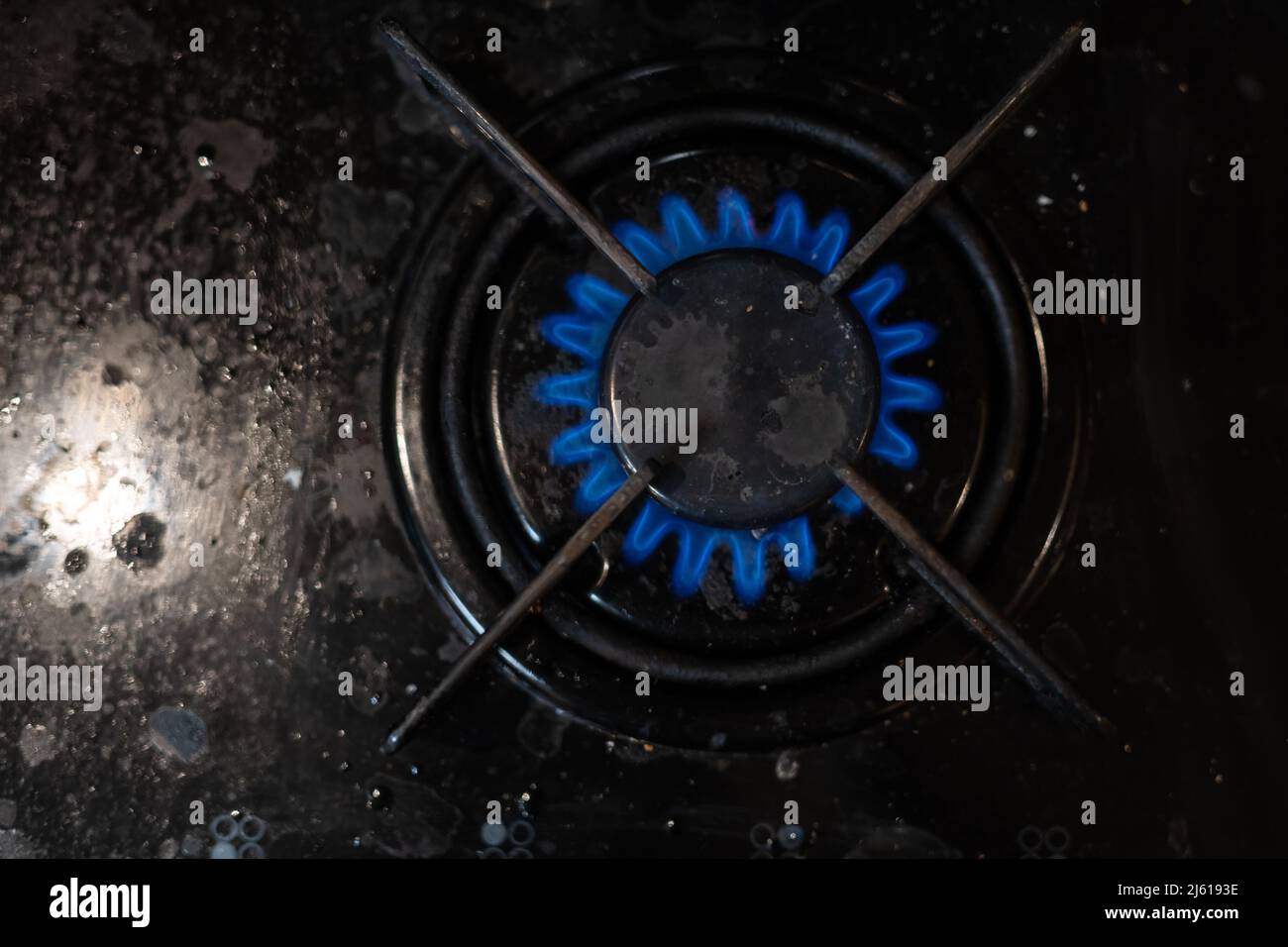dirty gas stove in the kitchen Stock Photo - Alamy