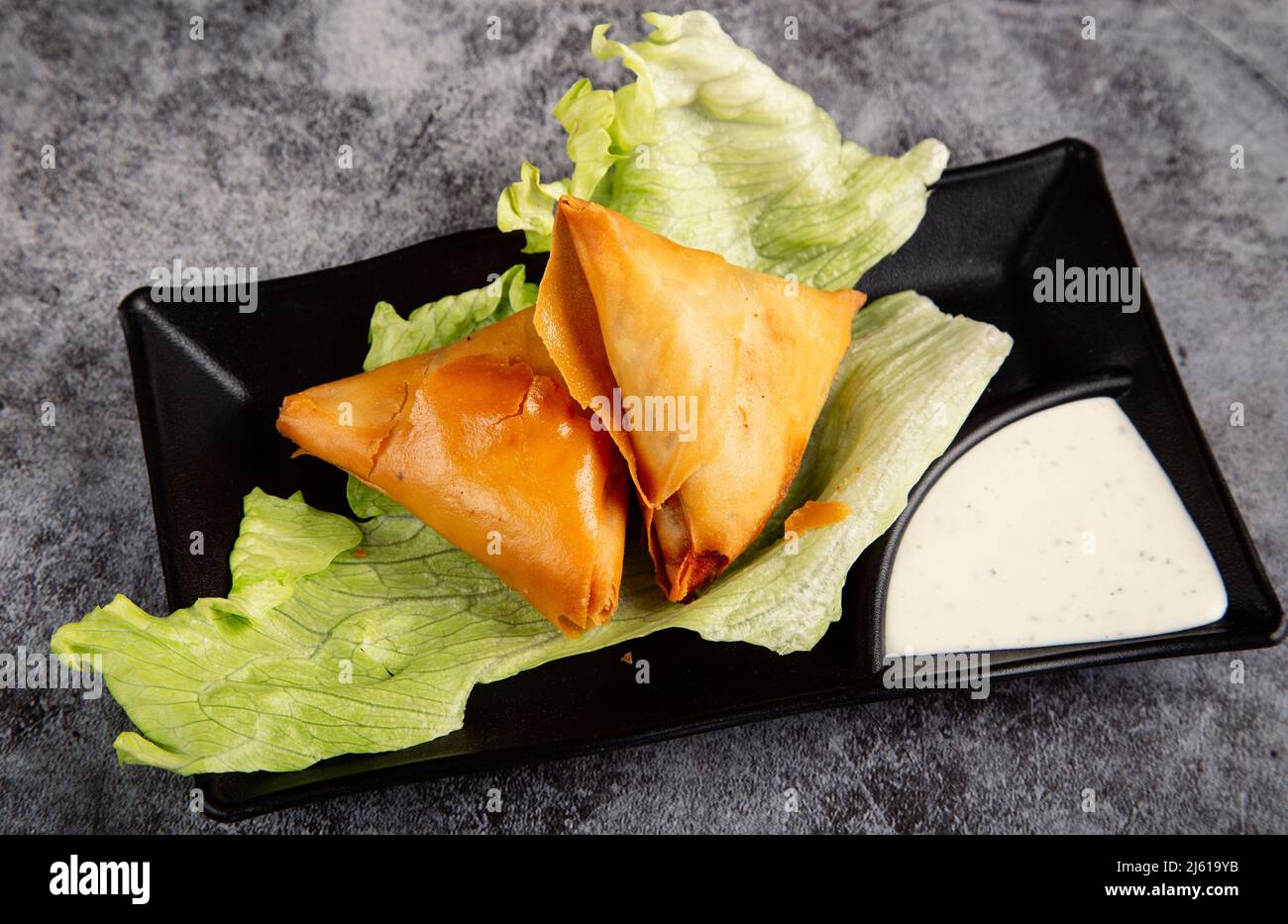 Veg Samosa - is a crispy and spicy Indian triangle shaped snack Stock ...