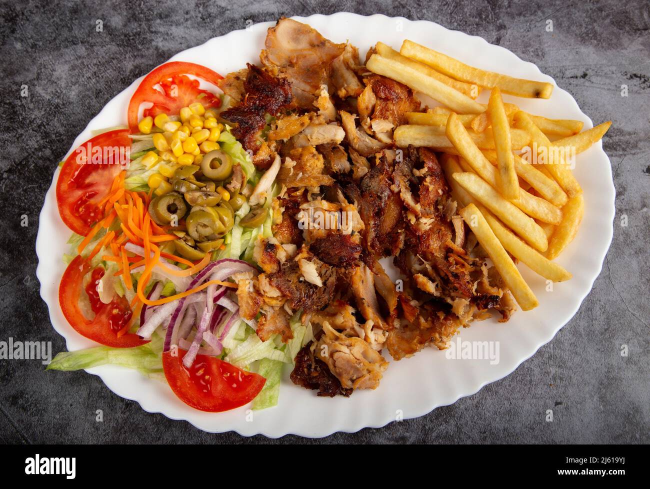 Kebab sandwich on white plate isolated Stock Photo - Alamy
