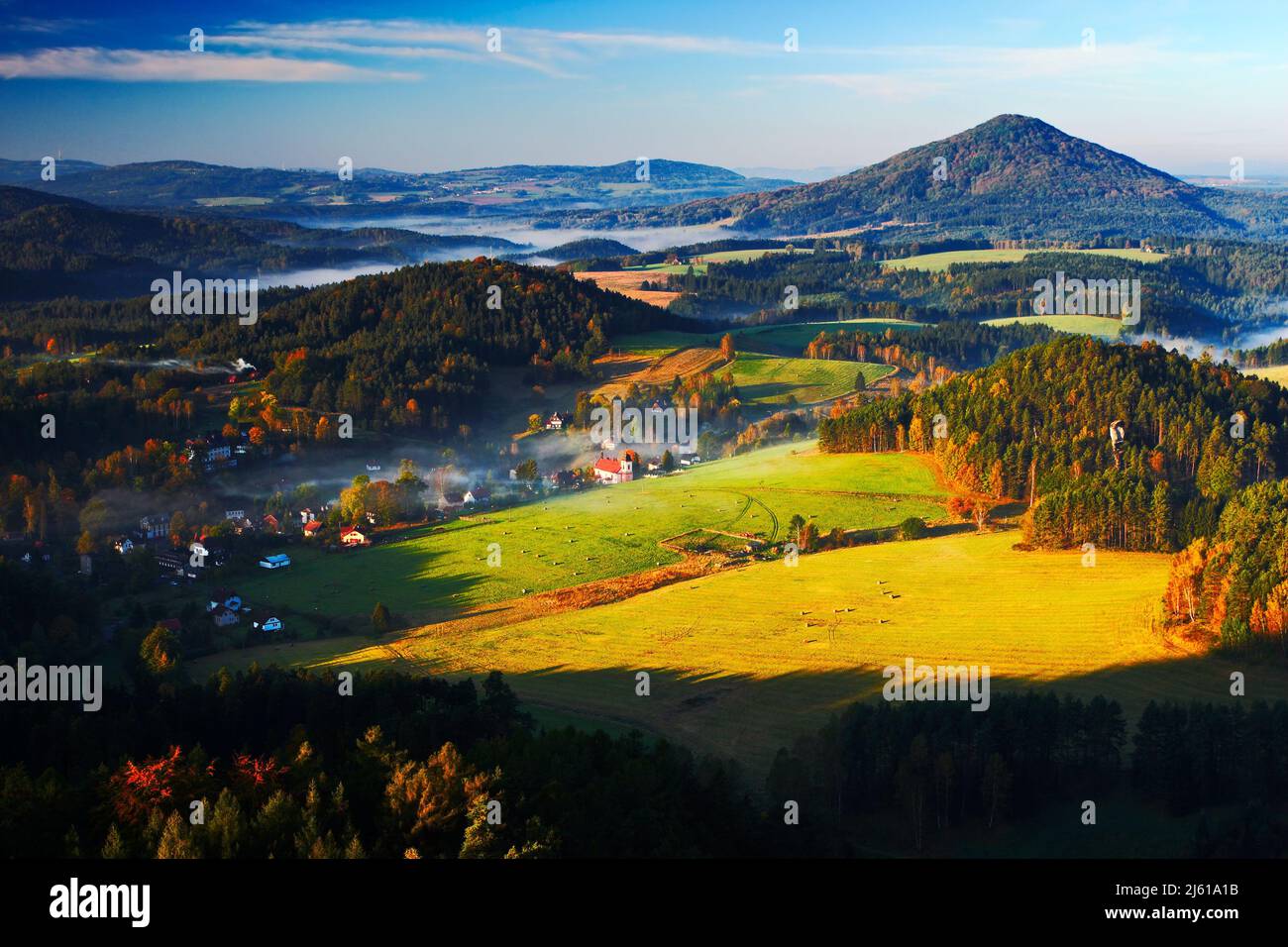 Czech typical autumn landscape. Hills and villages with foggy morning ...