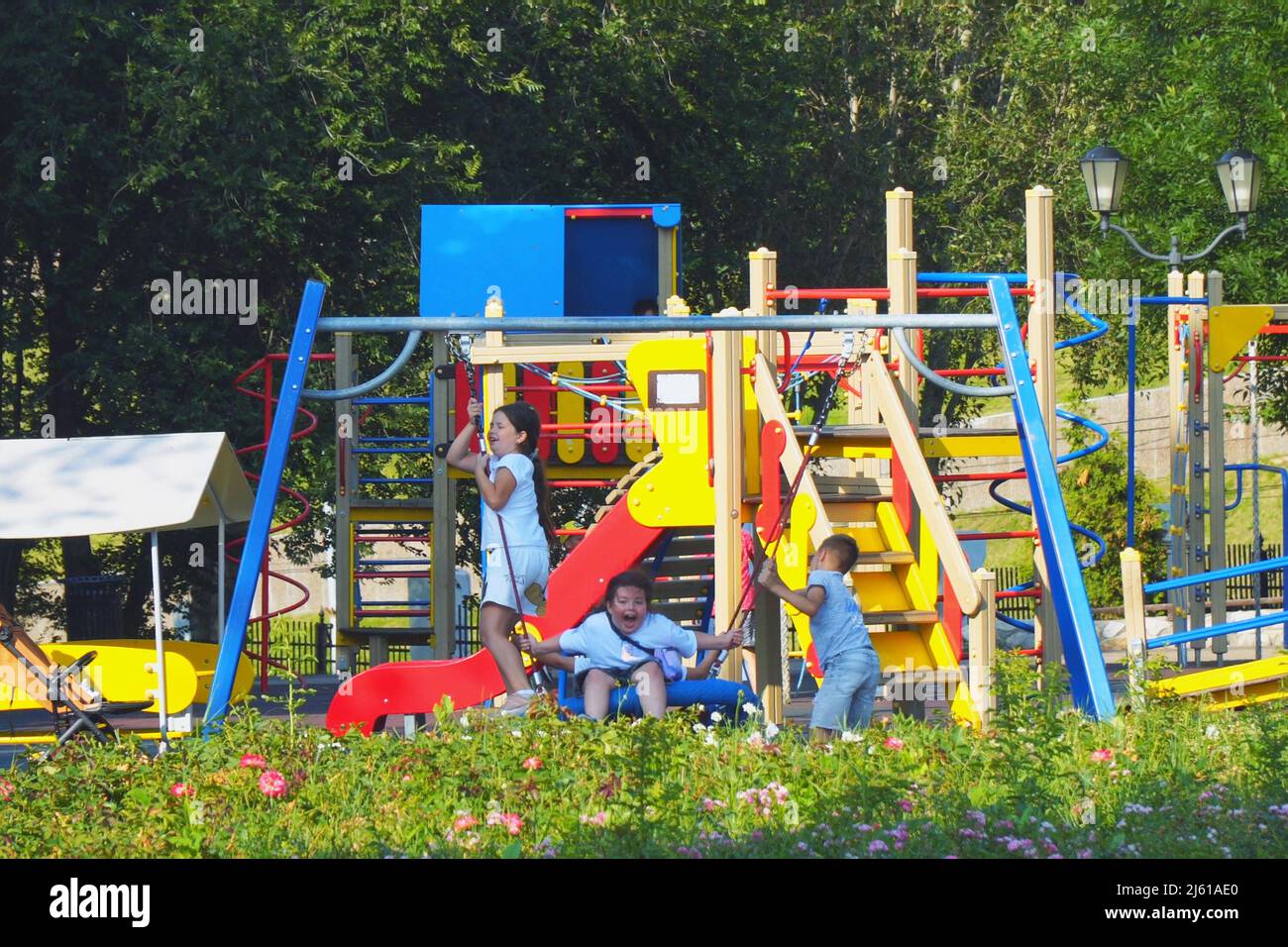 Children play on sandbox outdoors hi-res stock photography and images ...