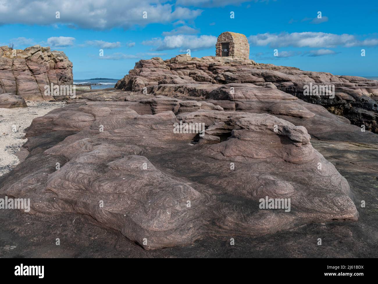 The old powder house on Seahouses beach Northumberland England UK Stock ...