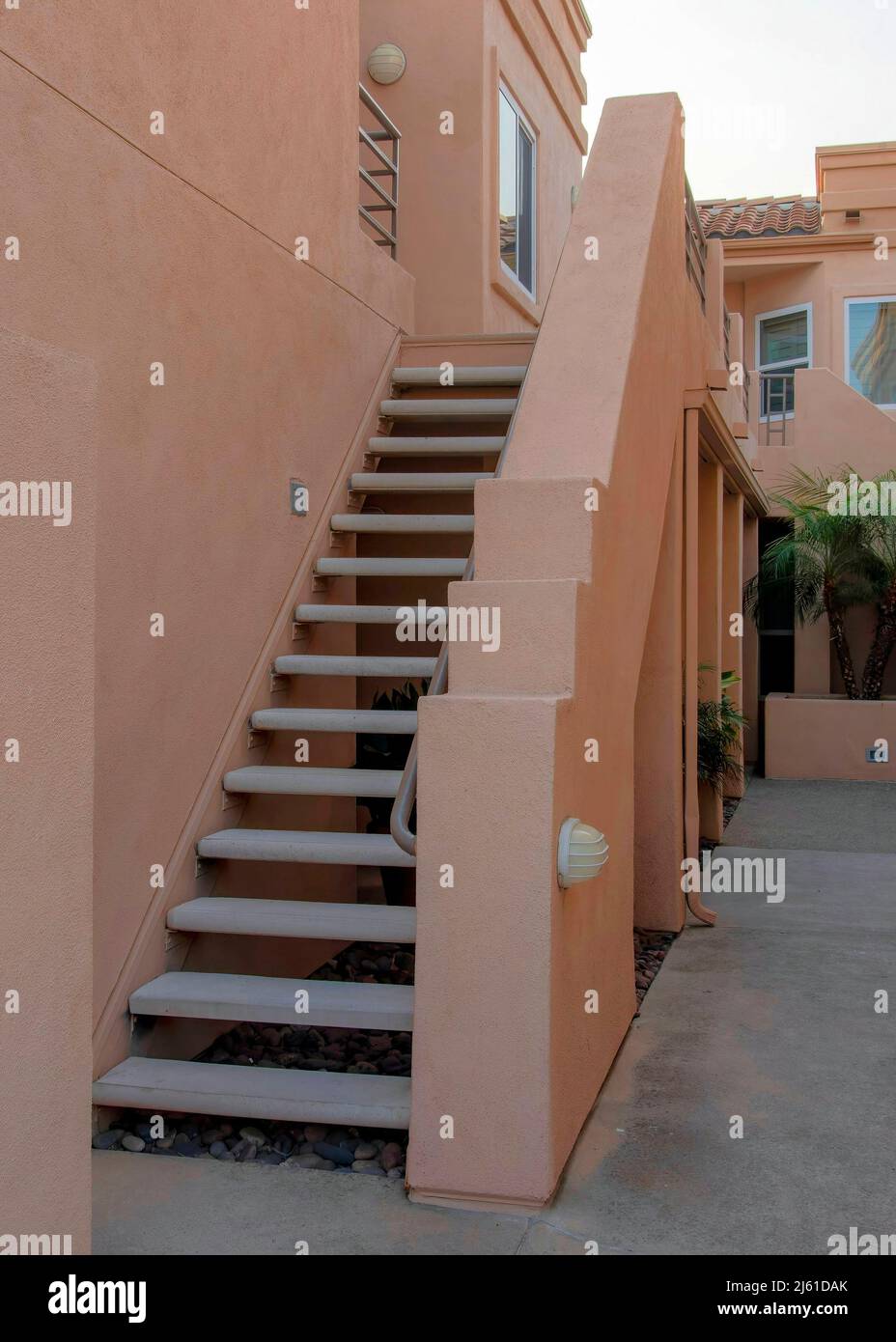 Vertical Staircase with wall mounted handrail at Oceanside, California ...