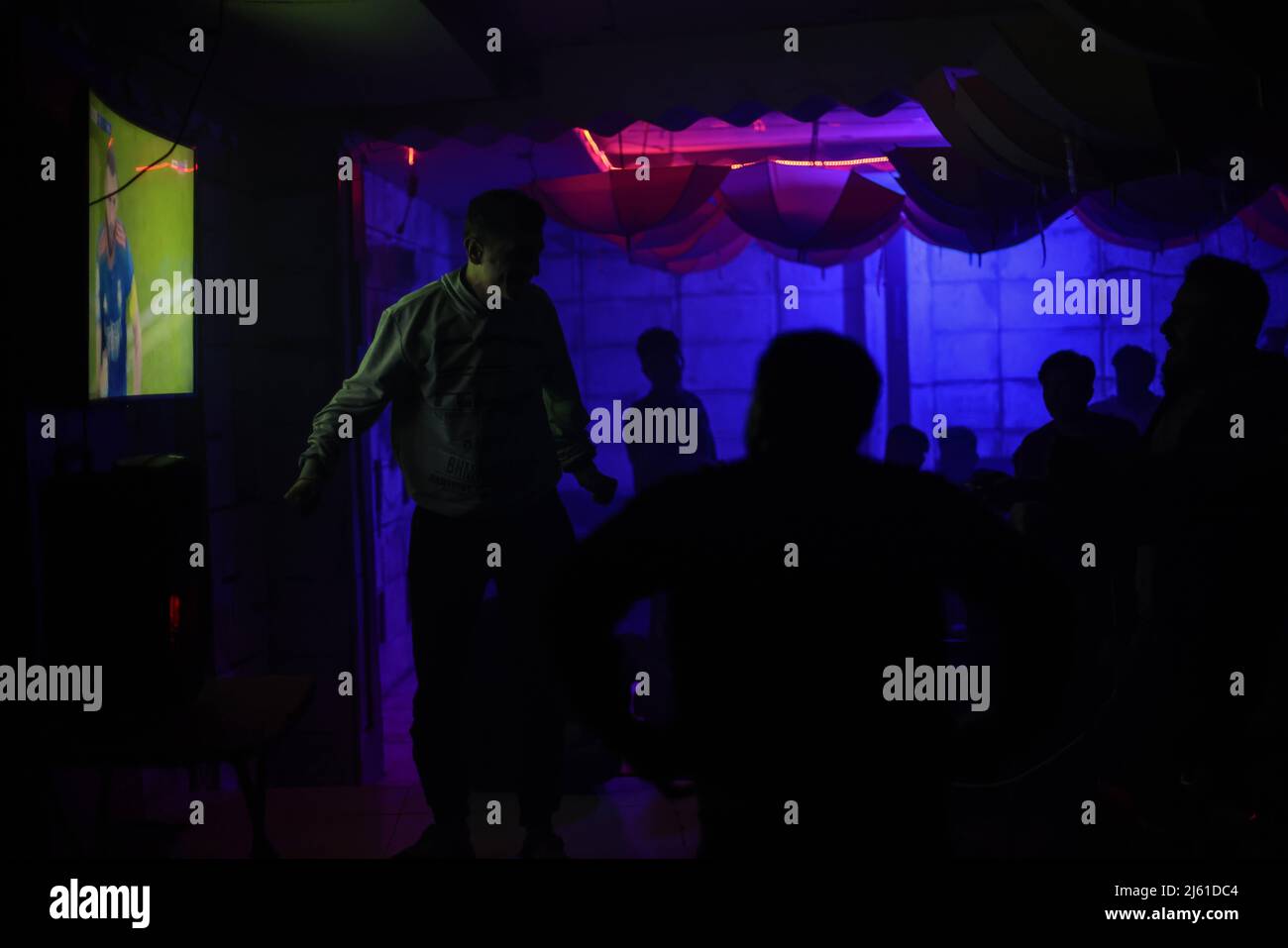 Ariha, Syria. 26th Apr, 2022. Young people watch a UEFA Europa League ...