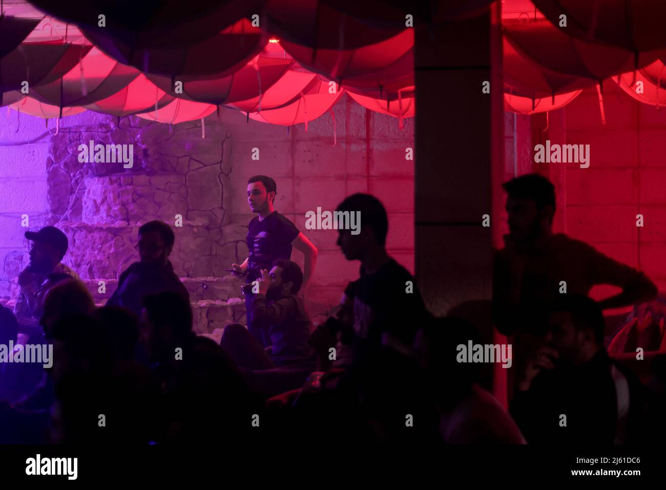 Ariha, Syria. 26th Apr, 2022. Young people watch a UEFA Europa League ...