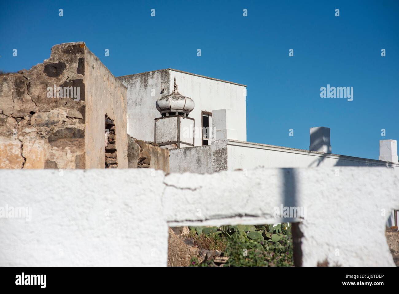 Beautiful chimneys are typical for traditional houses of Lanzarote, one ...