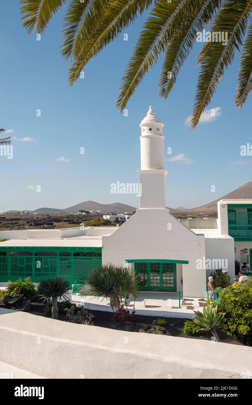 Beautiful chimneys are typical for traditional houses of Lanzarote, one ...