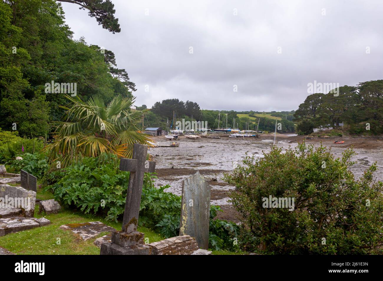 View of St. Just Pool at low tide from the churchyard garden of St ...