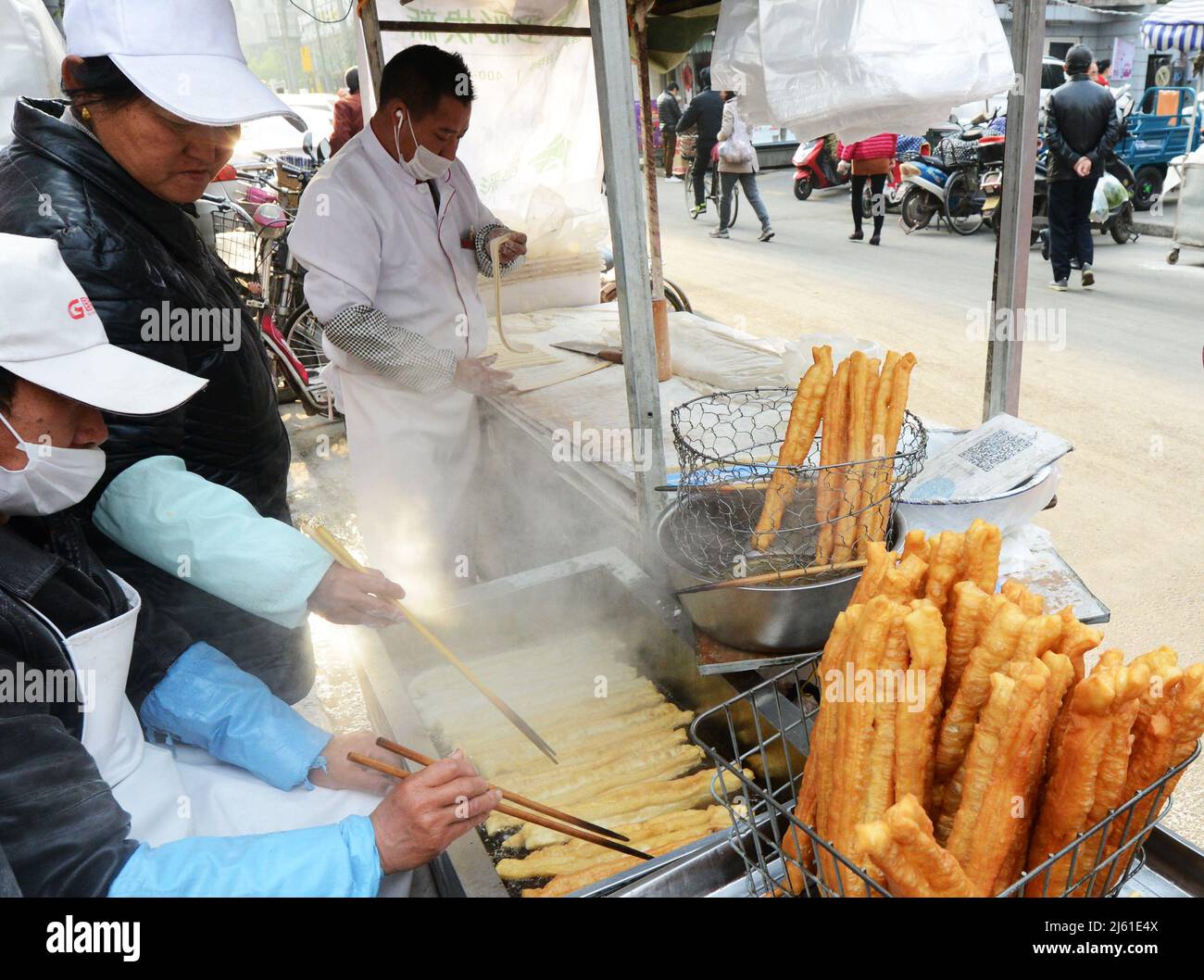 Chinese fried bread - Youtiao sold in almost every neighborhood in ...