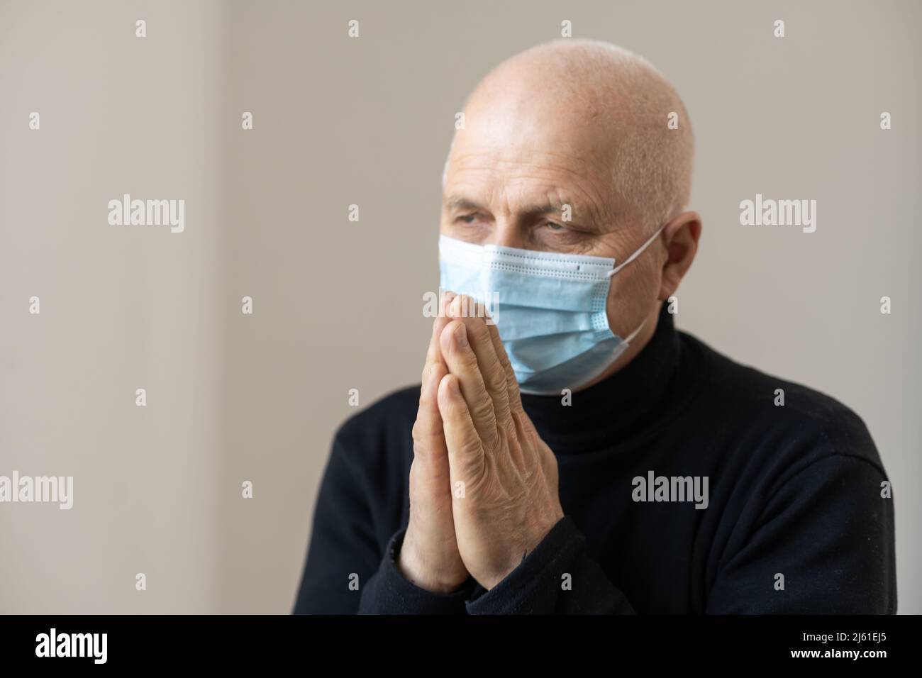 Elderly man at home mask isolation Stock Photo - Alamy