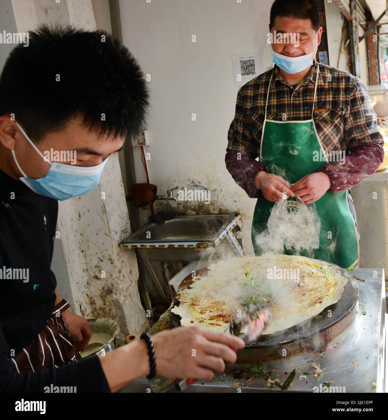 jiān bǐng is a very popular Chinese breakfast. these crispy pancakes ...