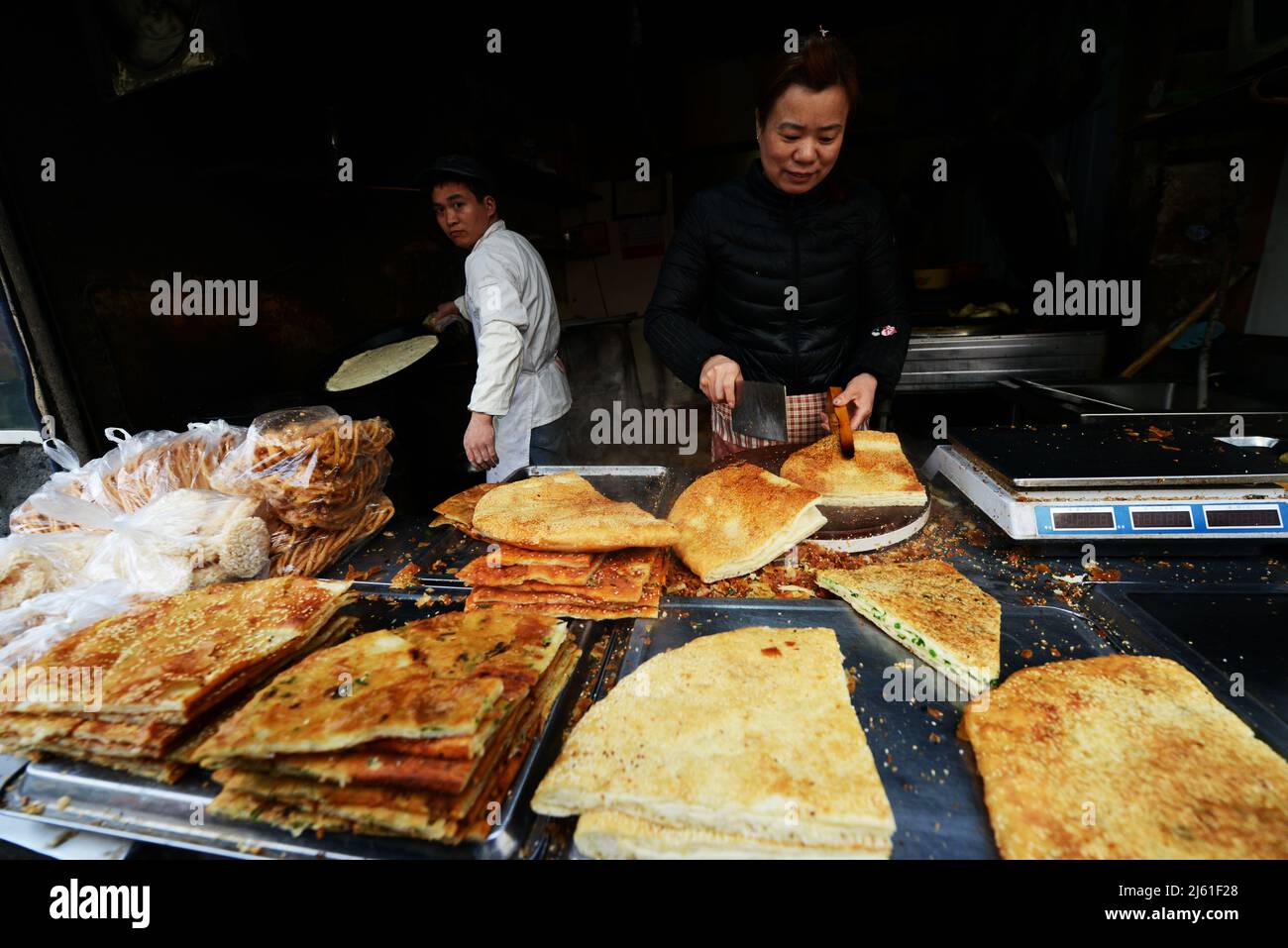 A Chinese Flatbread shop in a small market in Nanjing, China Stock ...