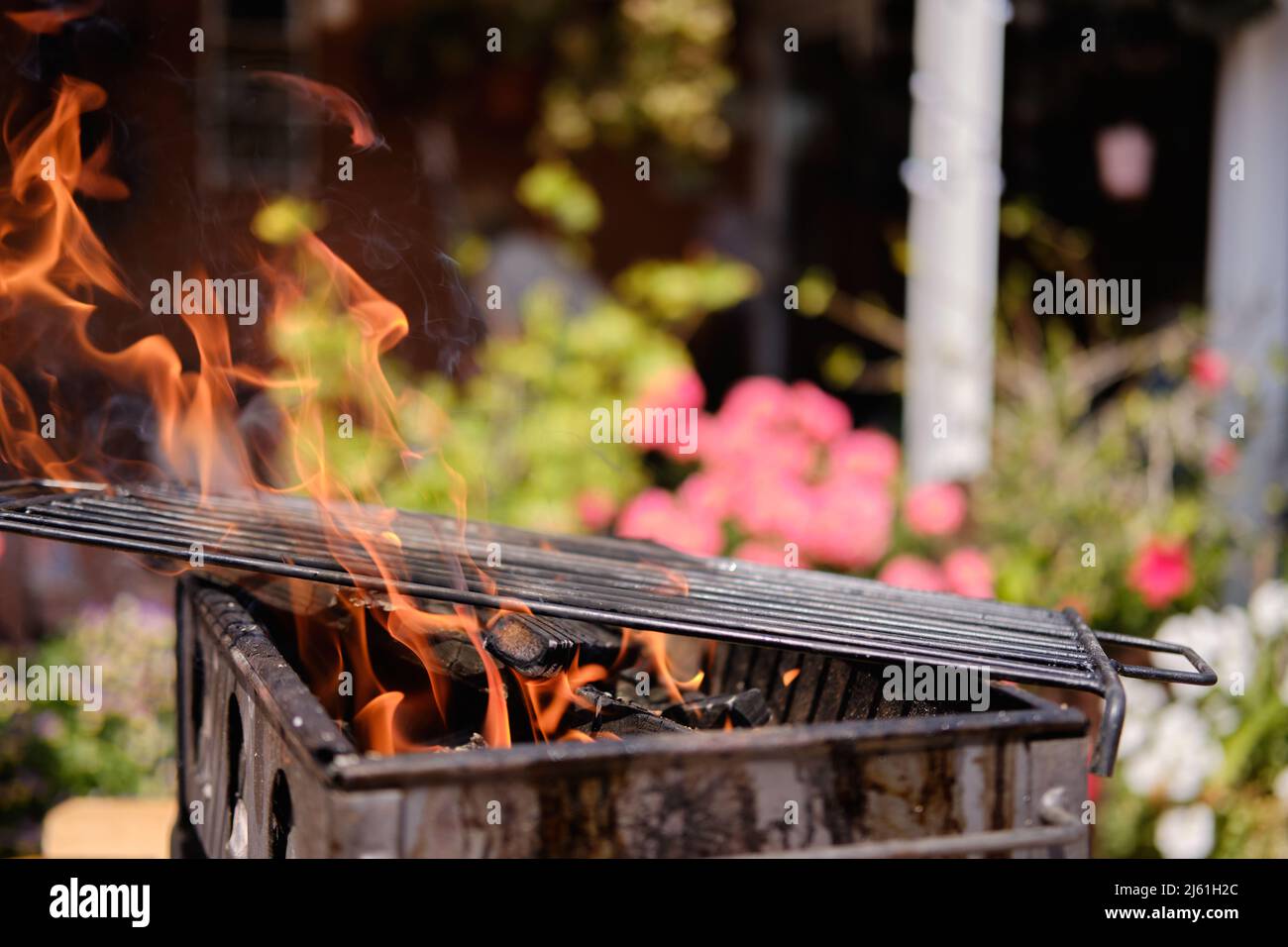 Barbecue Grill. Detail of Fire flames Stock Photo - Alamy