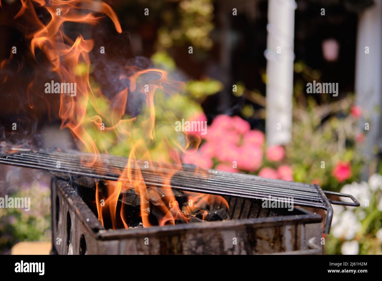 Barbecue Grill. Detail of Fire flames Stock Photo - Alamy