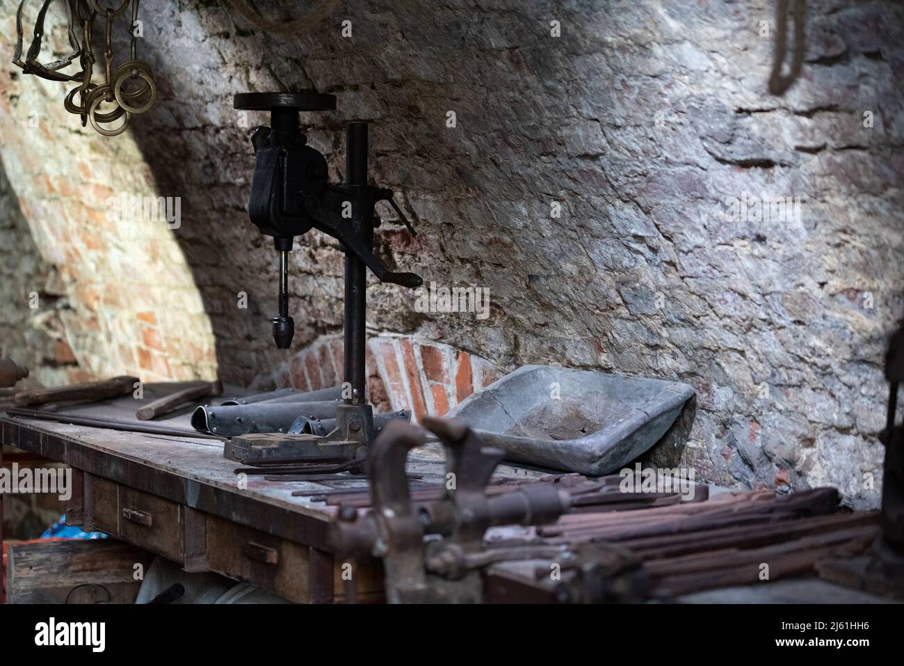 Old blacksmith's workshop, museum in Masovia. Hammers, horseshoes and ...